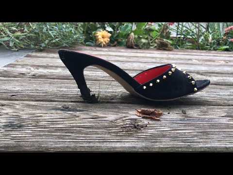 High heels stuck so badly between the planks