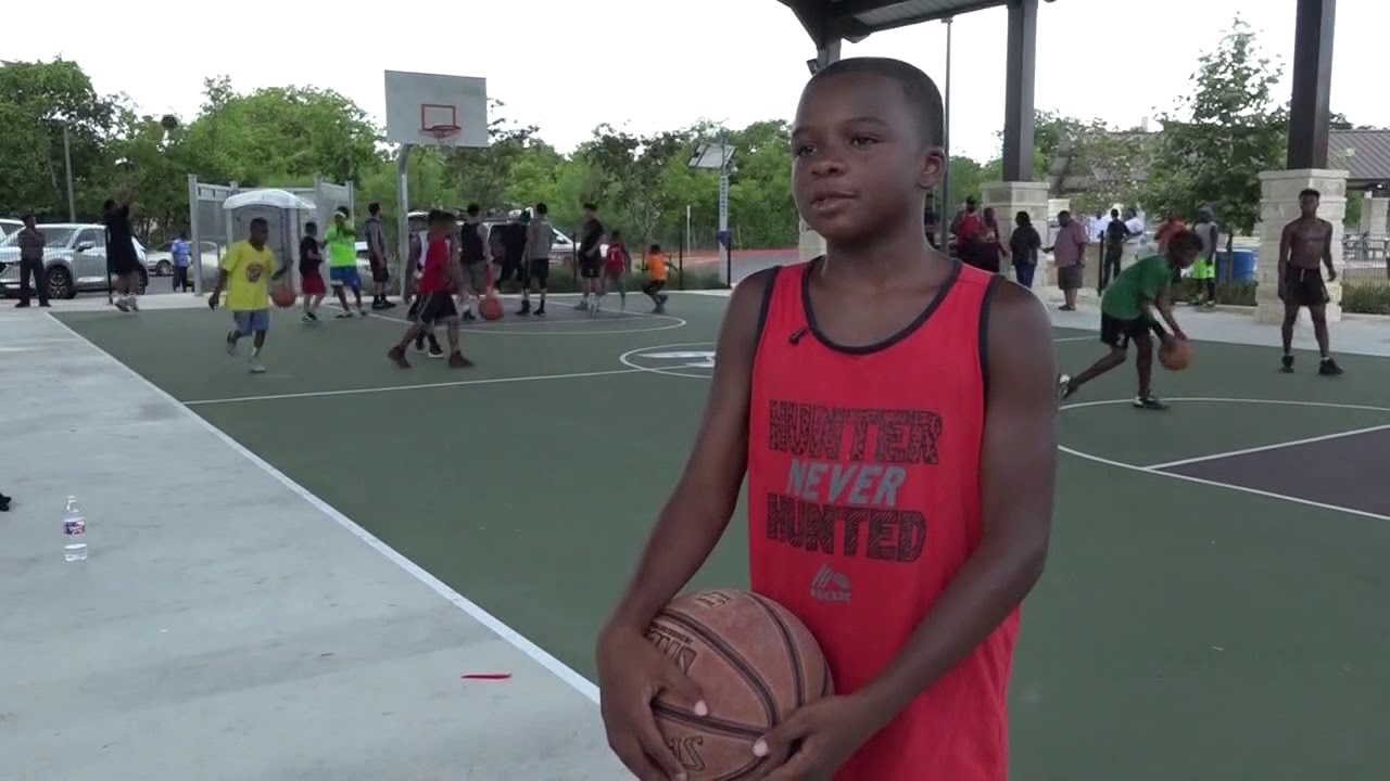 Police officers play basketball with local kids - YouTube