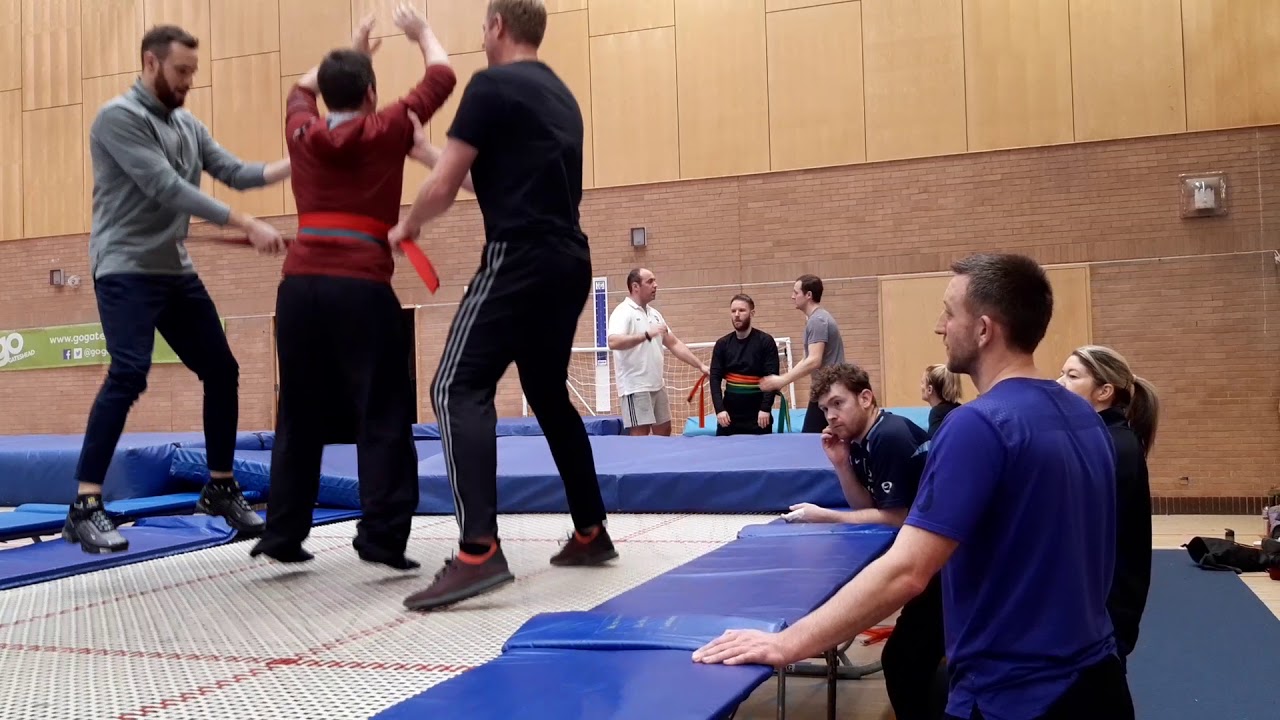 Backward Somersault Support practice using two coaching belts - YouTube