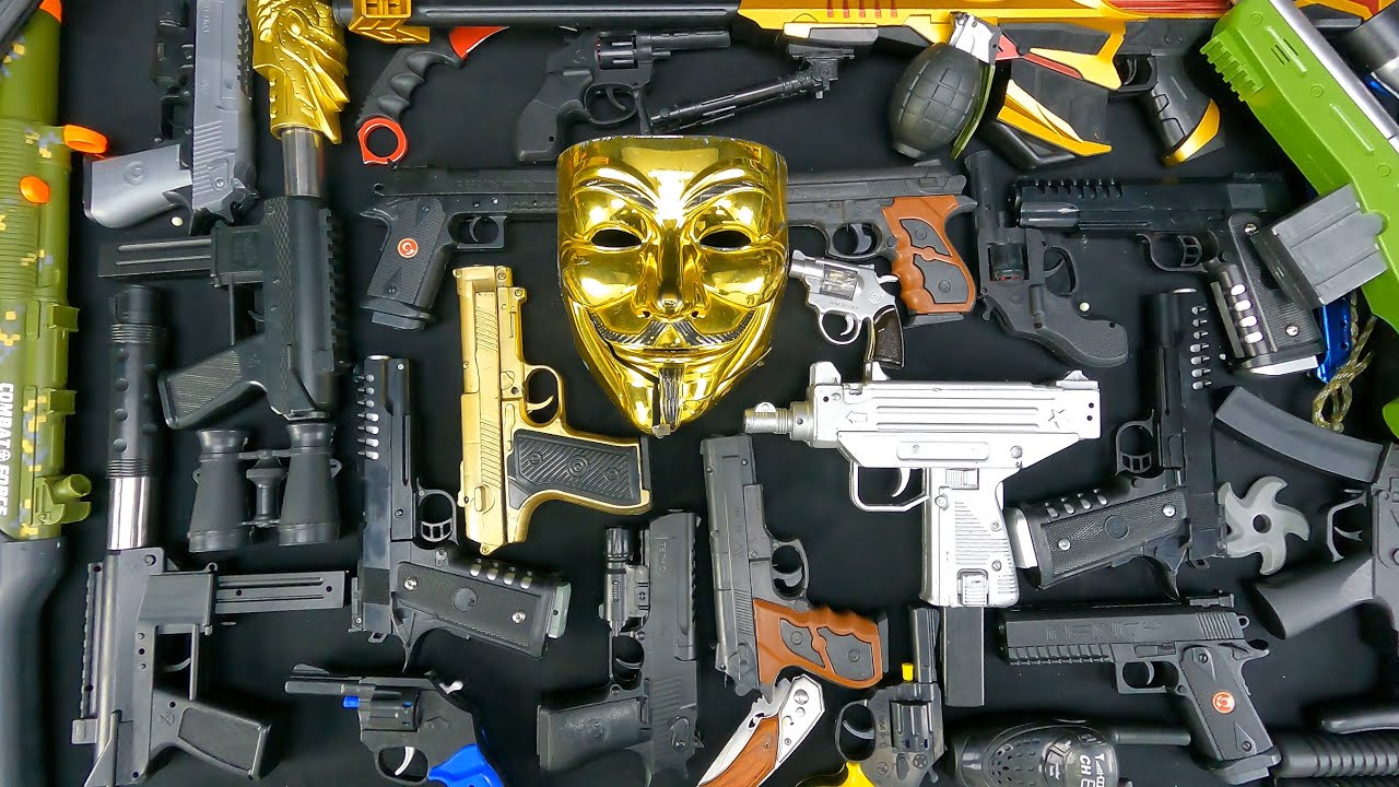 V for Vendetta Mask and Toy Bead Shooter Gold And Black Guns, Revolver ...