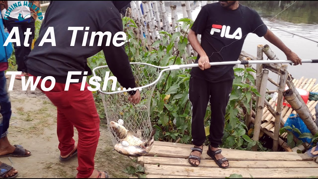 At a time two fish caught by hook. - YouTube