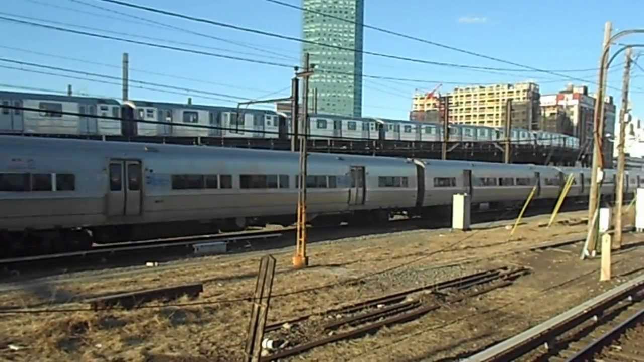 LIRR's M3 Train and NYC Subway's R62A 7 Train at Hunters Point at The ...