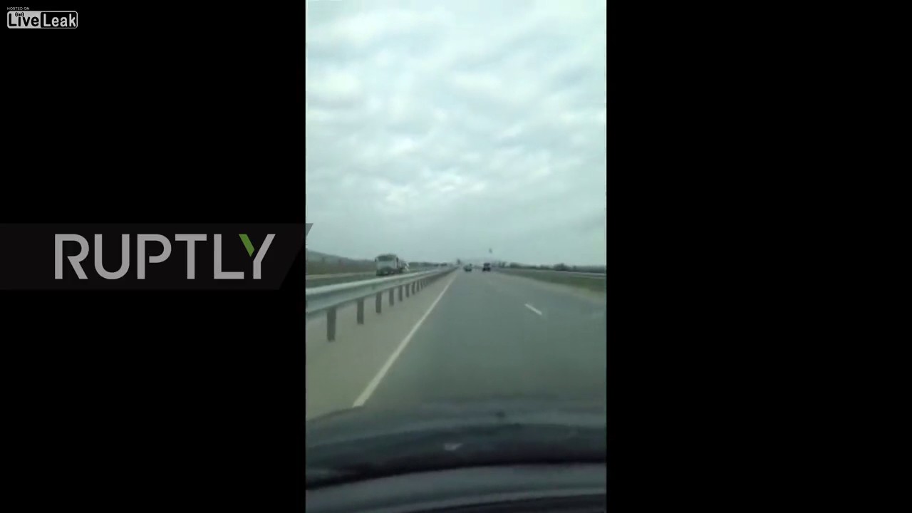 LiveLeak || Low-flying HELICOPTER startles drivers on Chechen highway ...