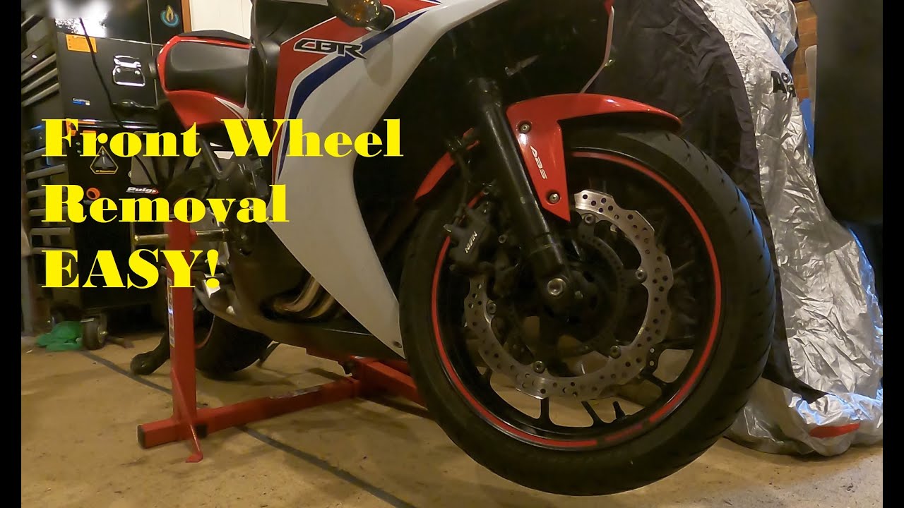 Simple front wheel removal | 2014 Honda CBR650F - YouTube