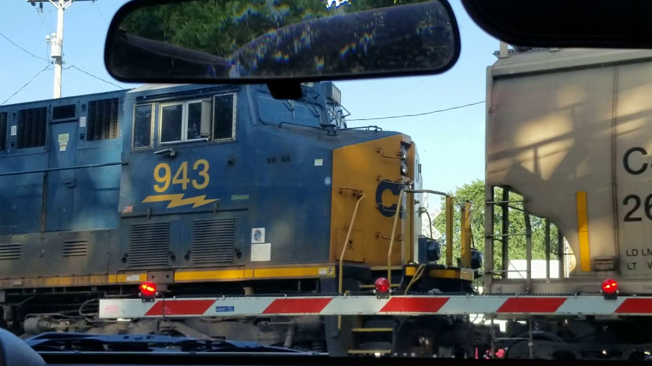 CSX 37, 7713, and 943 lead a Grain Train past Ash St in Terre Haute, IN ...