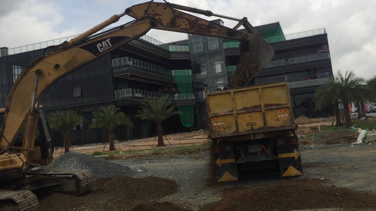 Excavator Cat Loading Trucks And Operator,excavators at work - YouTube