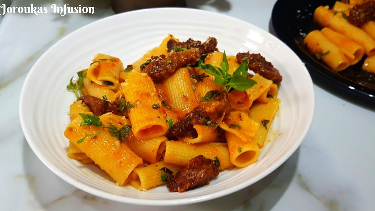 How to Cook the Best Beef Pasta. Rigatoni Pasta in a rich tomato sauce ...