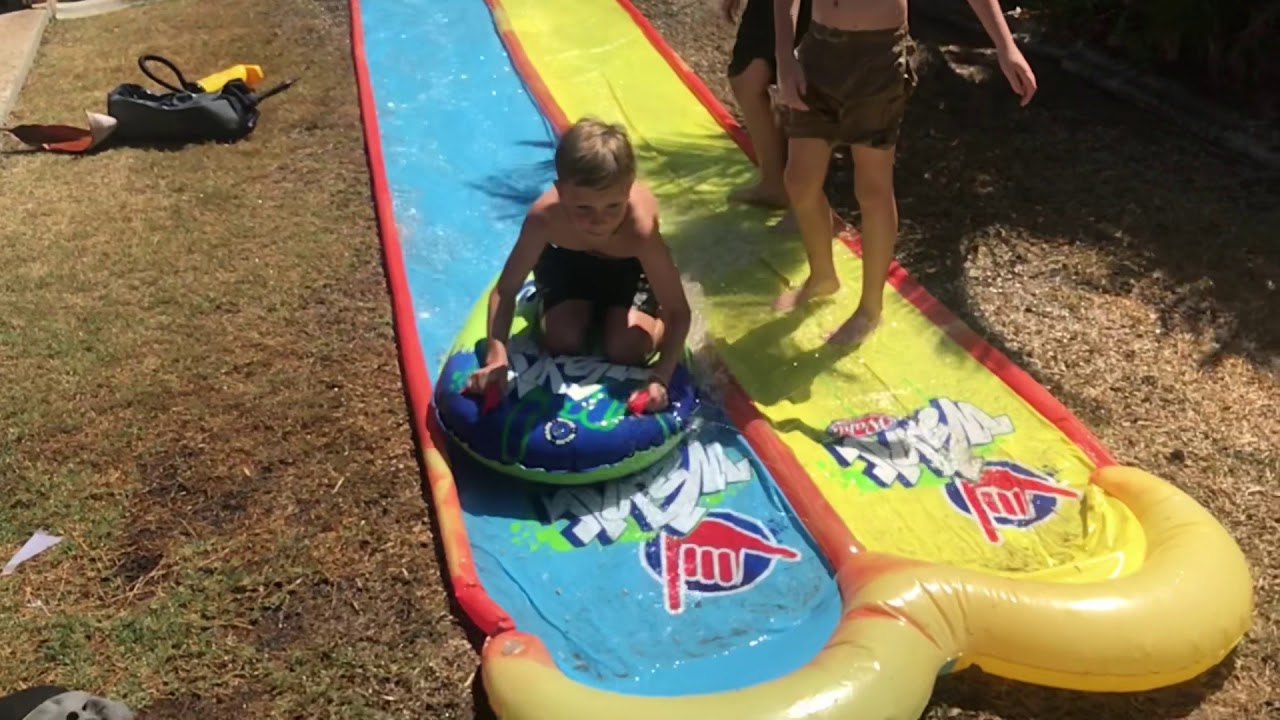 Slow mo slip and slide with friends - YouTube