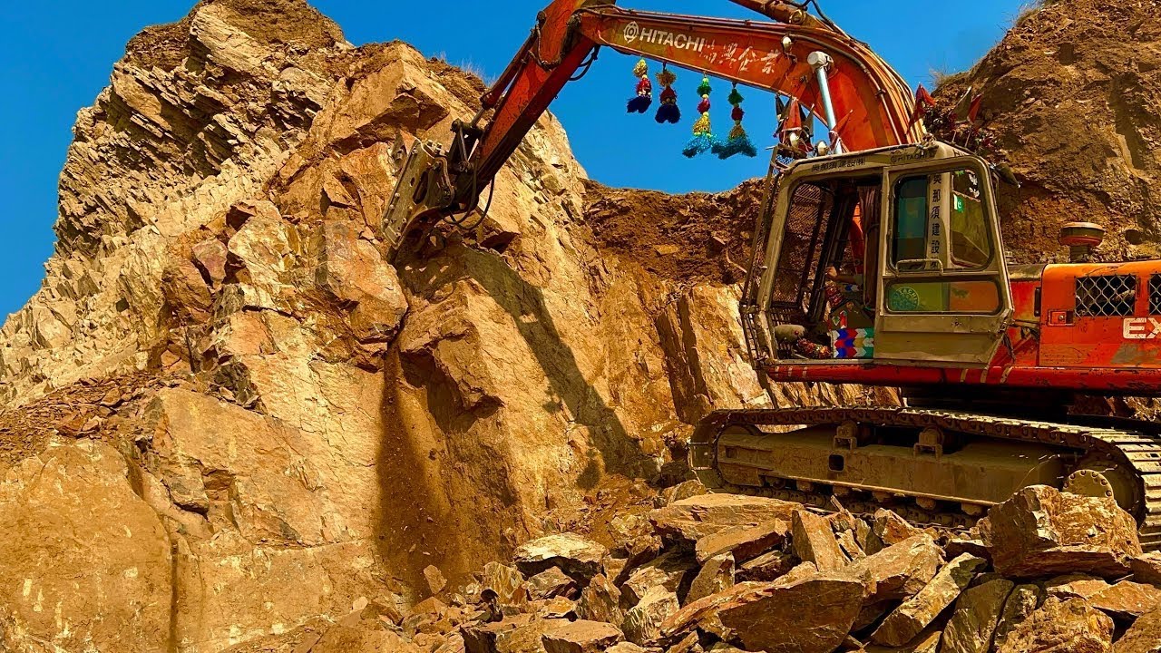 "Massive Rock Break with Excavator: Excavator's Power and Precision in ...