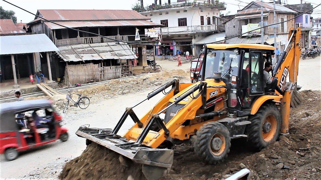 JCB Working For Road Construction - JCB Dozer Leveling Mud In Road ...