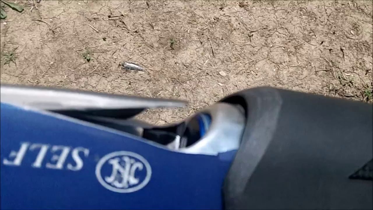 FNH SLP Shotgun Loading Port Opened for Quad Loads - YouTube