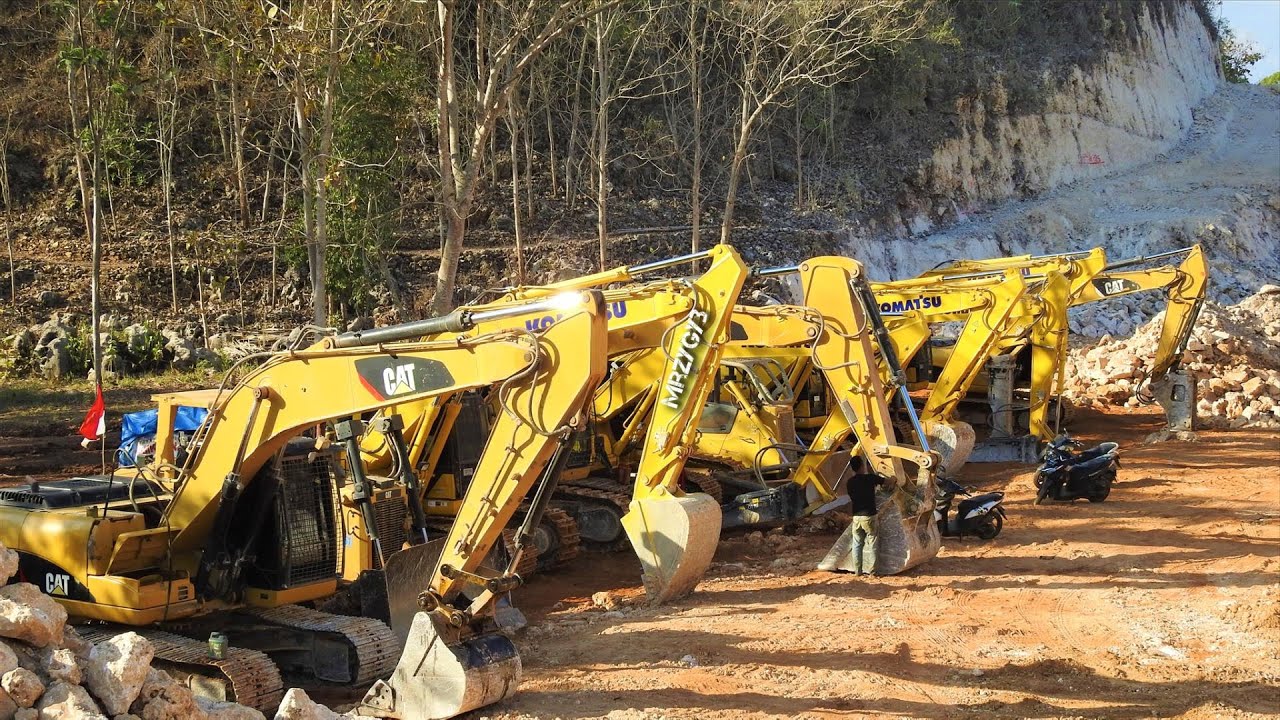 Bulldozer Excavator Digging Cutting The Limestone Hill For The New Road ...