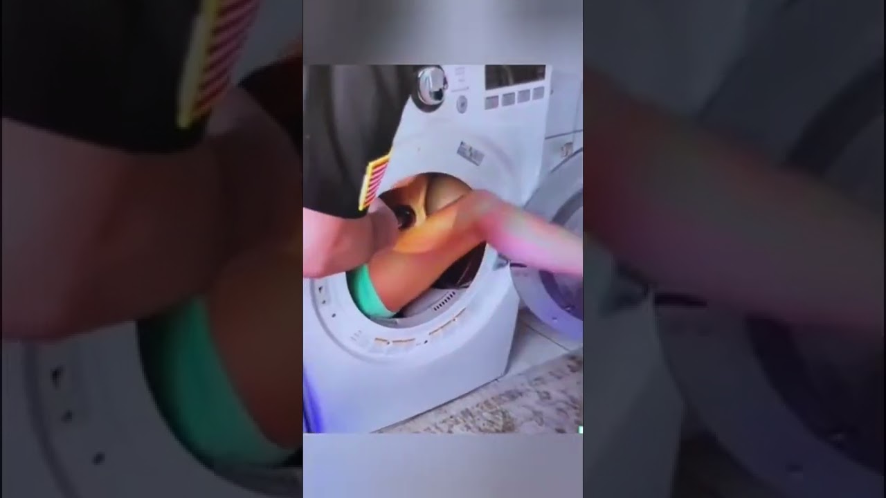 Woman gets stuck in washing machine - YouTube