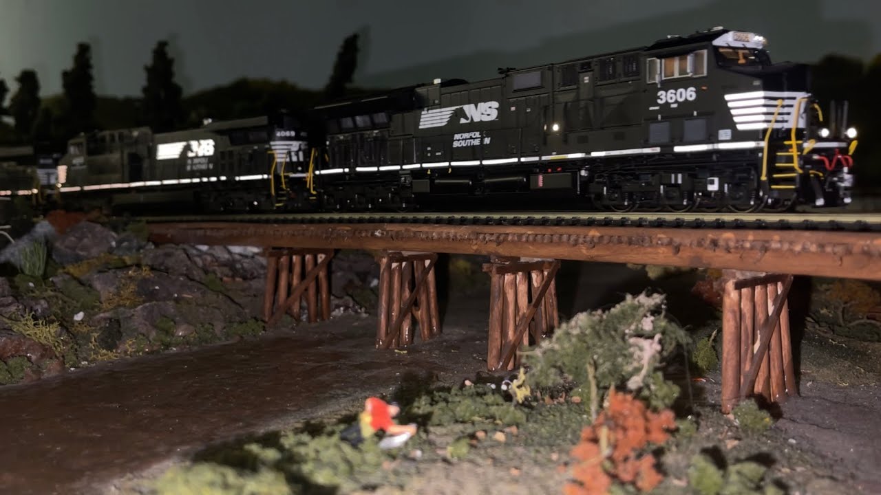 NS ET44AC AC44C6M ES44AC as 44X-16 pulling off from a stop uphill into ...