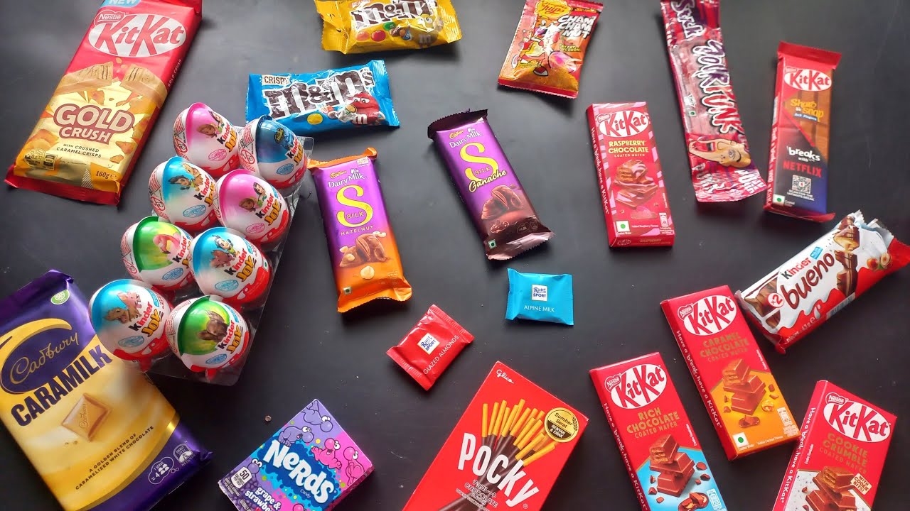 Lots of candies, surprise toys, chocolate opening video, lots of ...