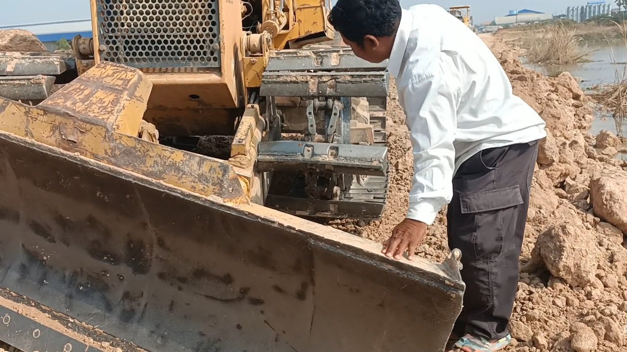 Road construction activities of bulldozer KomatsuD31 - YouTube