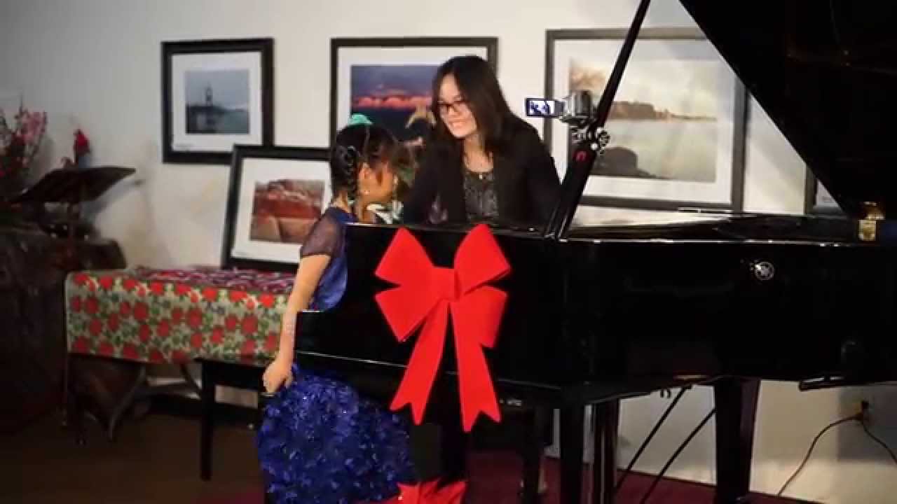 Ruby's First Piano Recital playing duet with teacher. - YouTube
