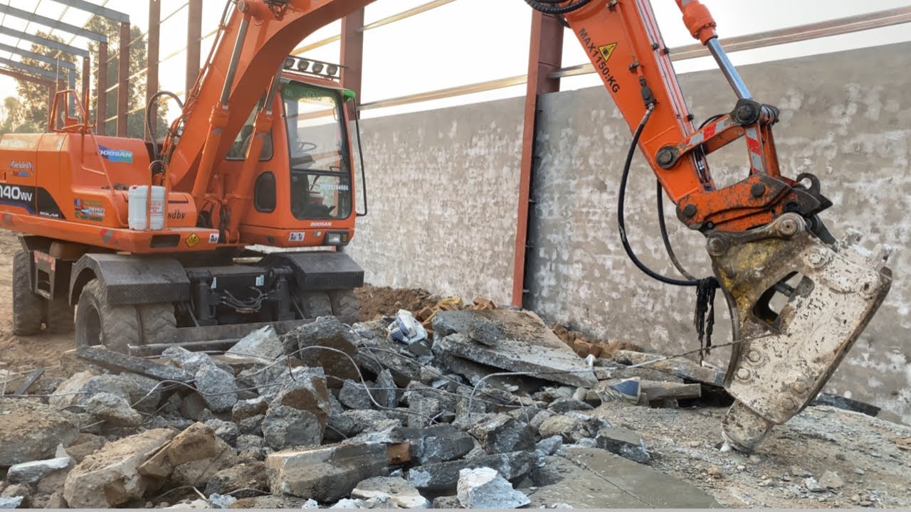 Hydraulic Breaker Working On Concrete Slabs - YouTube