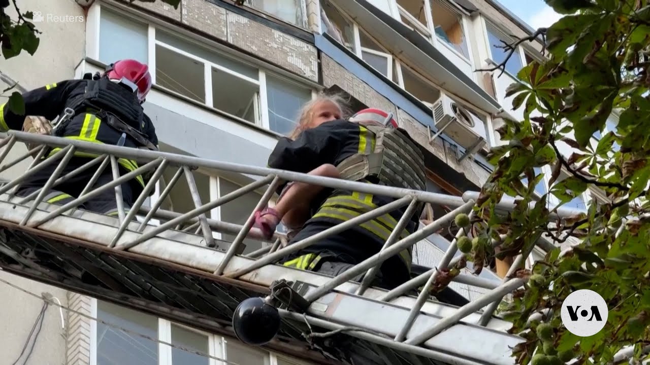 Firefighters rescue child and woman trapped by fire after Russian ...