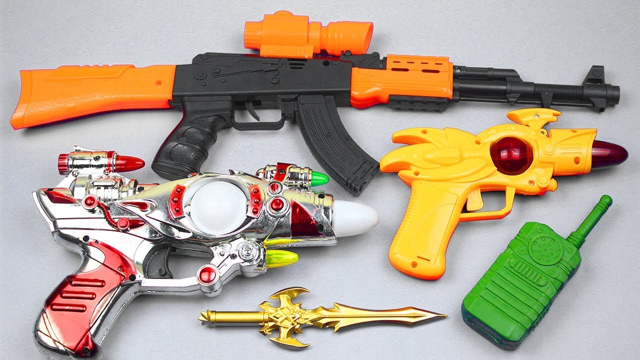 Learn colors with Box Full Of Toys many colored toy guns equipment for ...