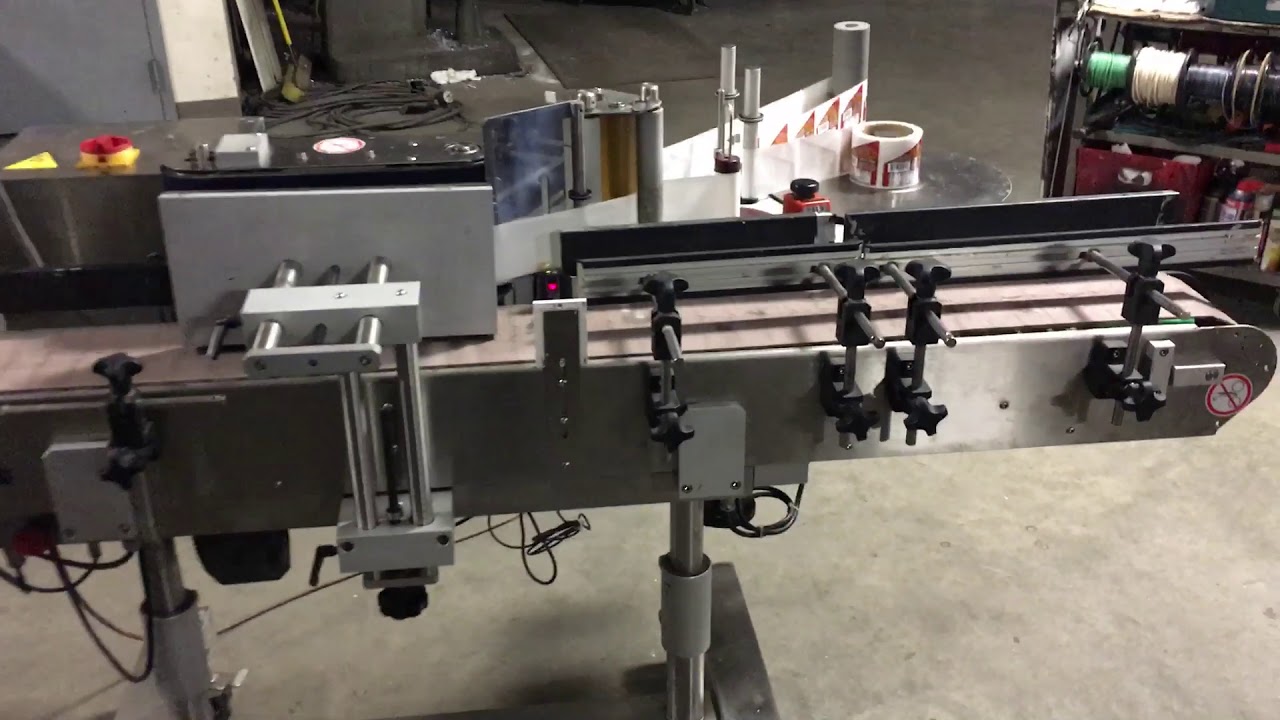 CVC Model 300-II Inline Wrap Around Pressure Sensitive Labeler - YouTube