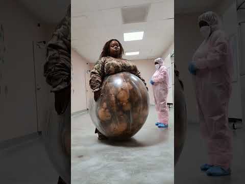 A woman experiencing an alien pregnancy