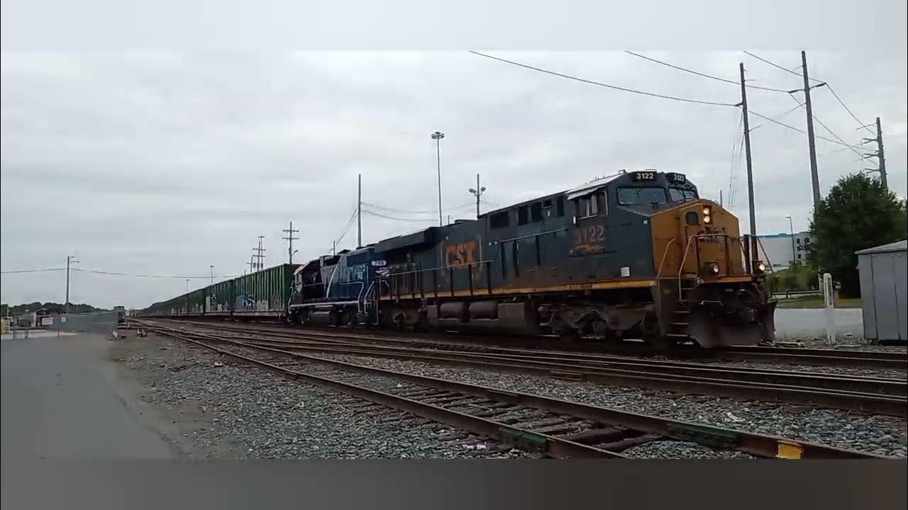 CSX M409 cruising west through Landenberg Junction on 9-23-24 w/ phase 7 Amtrak GP38-3 in tow ...