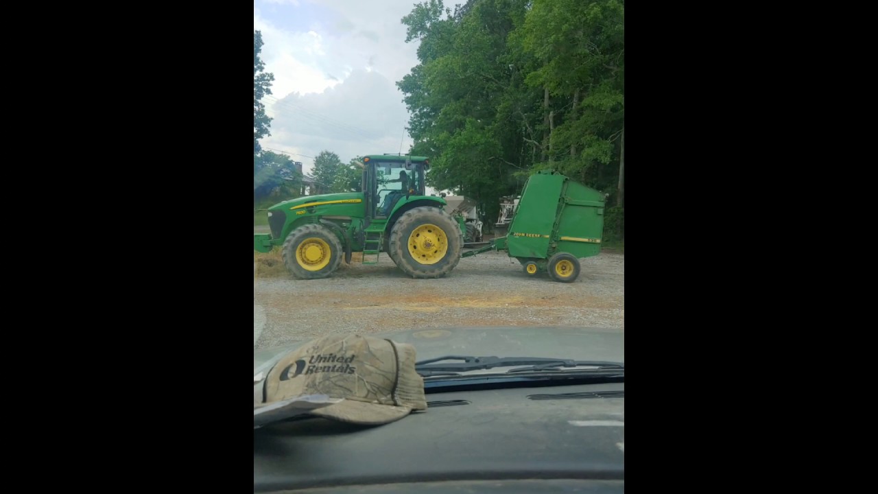 John deere 4450 mowing and baling hay - YouTube