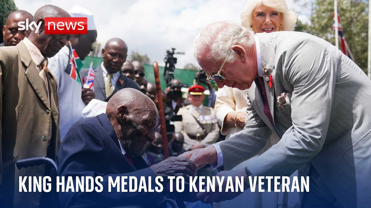 King hands medals to Kenyan veteran thought to be 117 years old - YouTube