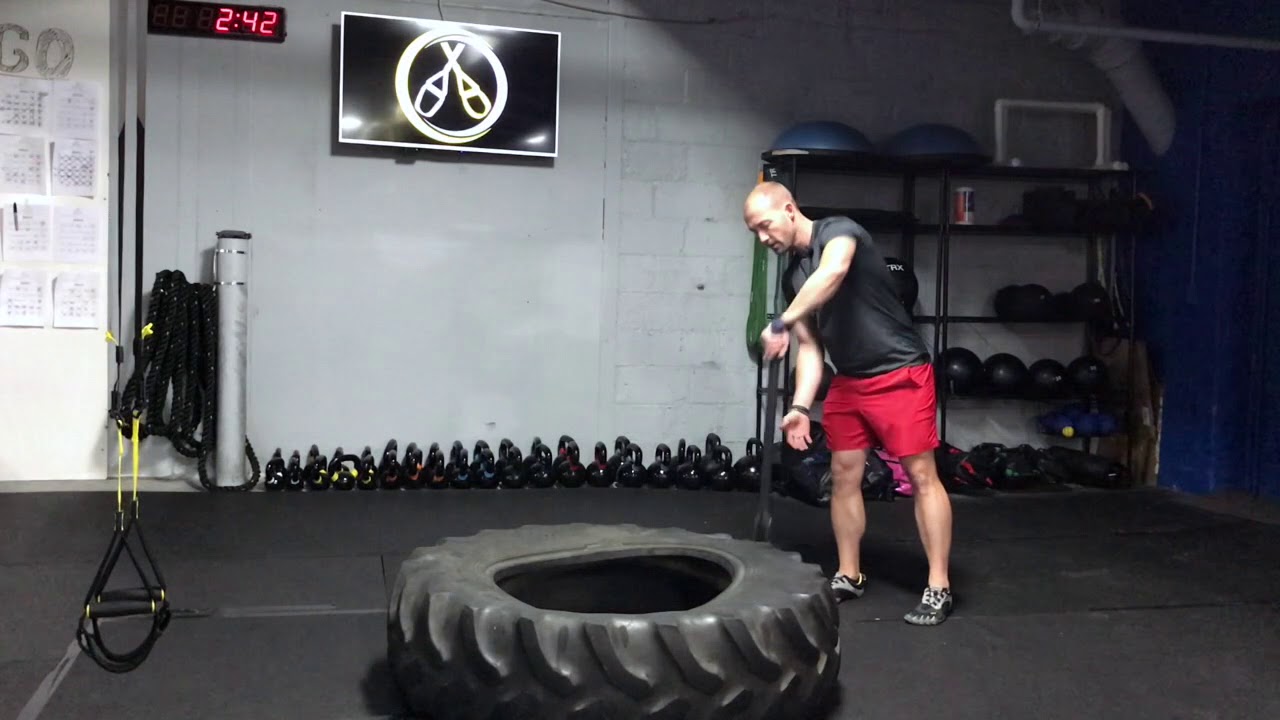 How to Perform Rotational Sledge Hammer Slams - YouTube