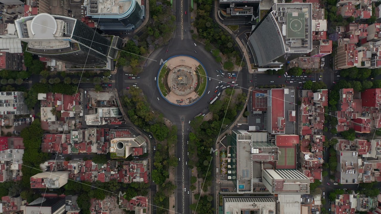 Aerial birds eye overhead top down view of traffic in wide city street ...