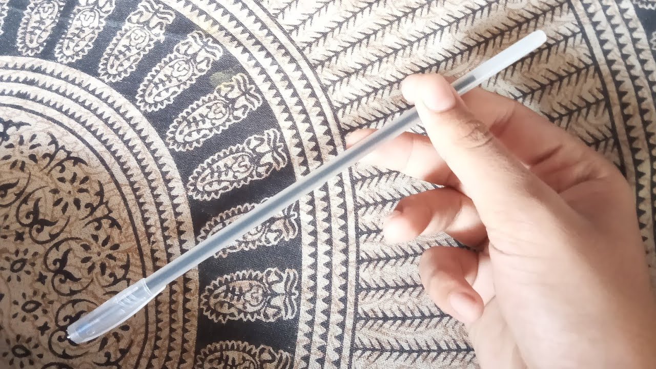 How to spin a pen with own finger - YouTube