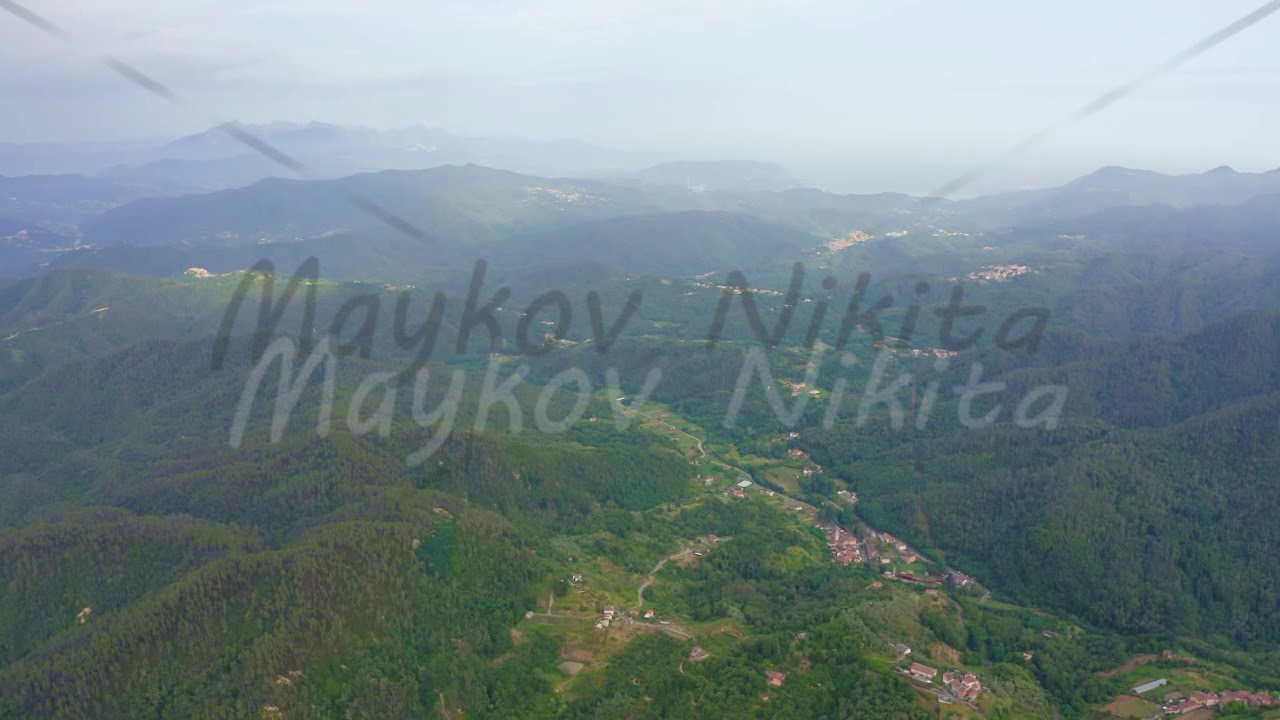 Italy. Forest covered mountains and villas. The territory of Pignone in ...