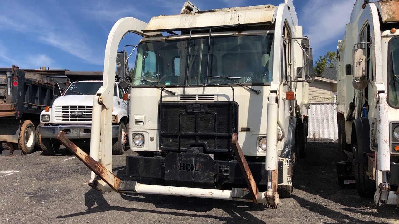 2007 Autocar Front Loader Refuse Truck - YouTube