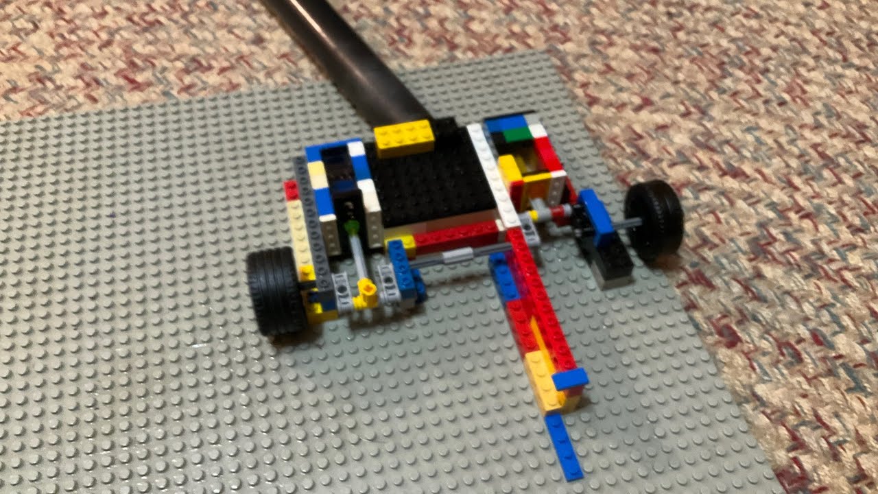 Lego 2 cylinder oscillating vacuum engine running - YouTube