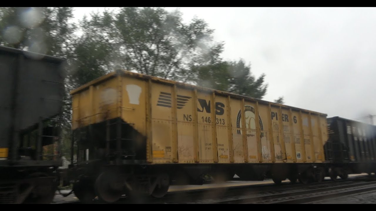 Empty Coal hoppers in the rain w/ pier 6 - YouTube