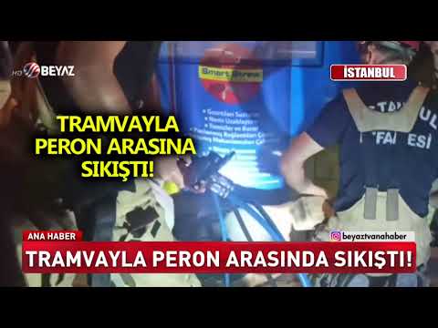 Tramvayla peron arasında sıkıştı!