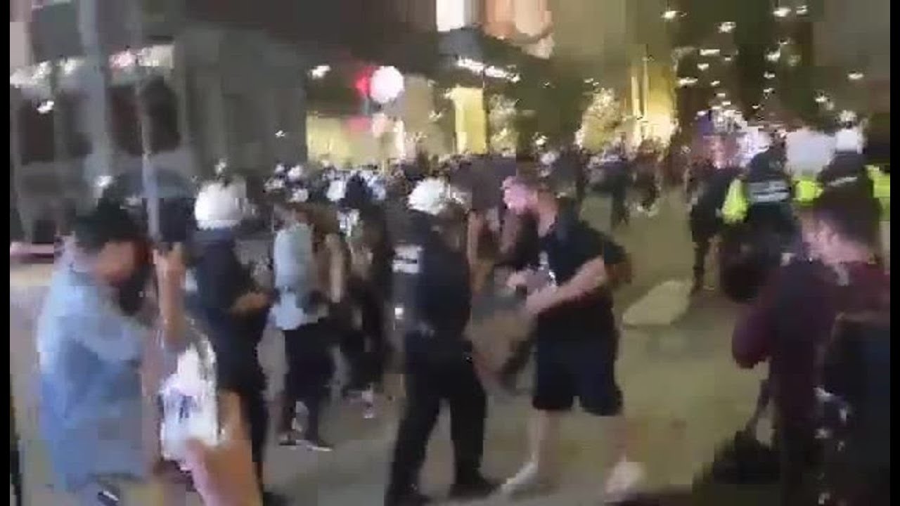 Montreal Police try and disperse crowd from the Bell Centre - YouTube