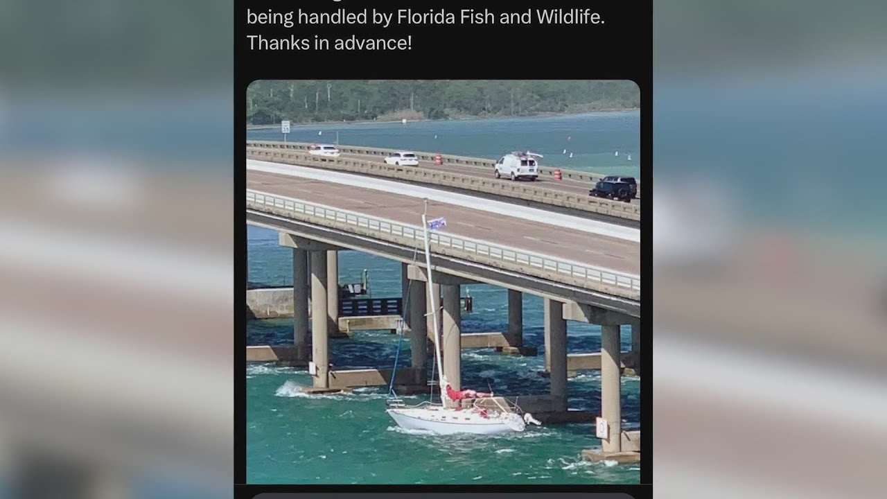 Sailboat breaks loose in Destin, sinks at Marler Bridge - YouTube