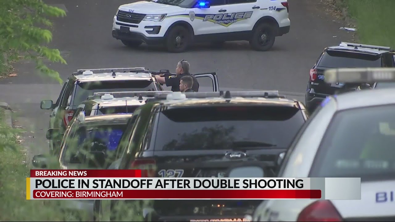 Police in standoff after double shooting - YouTube
