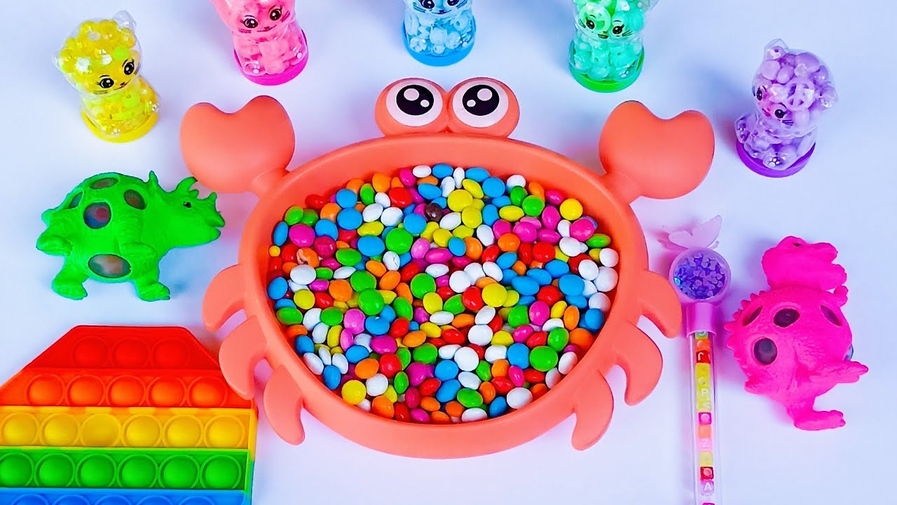 Satisfying video | Crab in the bathroom mixing rainbow slime and M&M ...