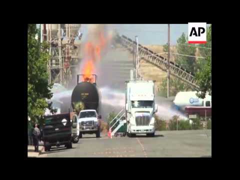 Firefighters took a bold step Wednesday to drain a burning propane ...
