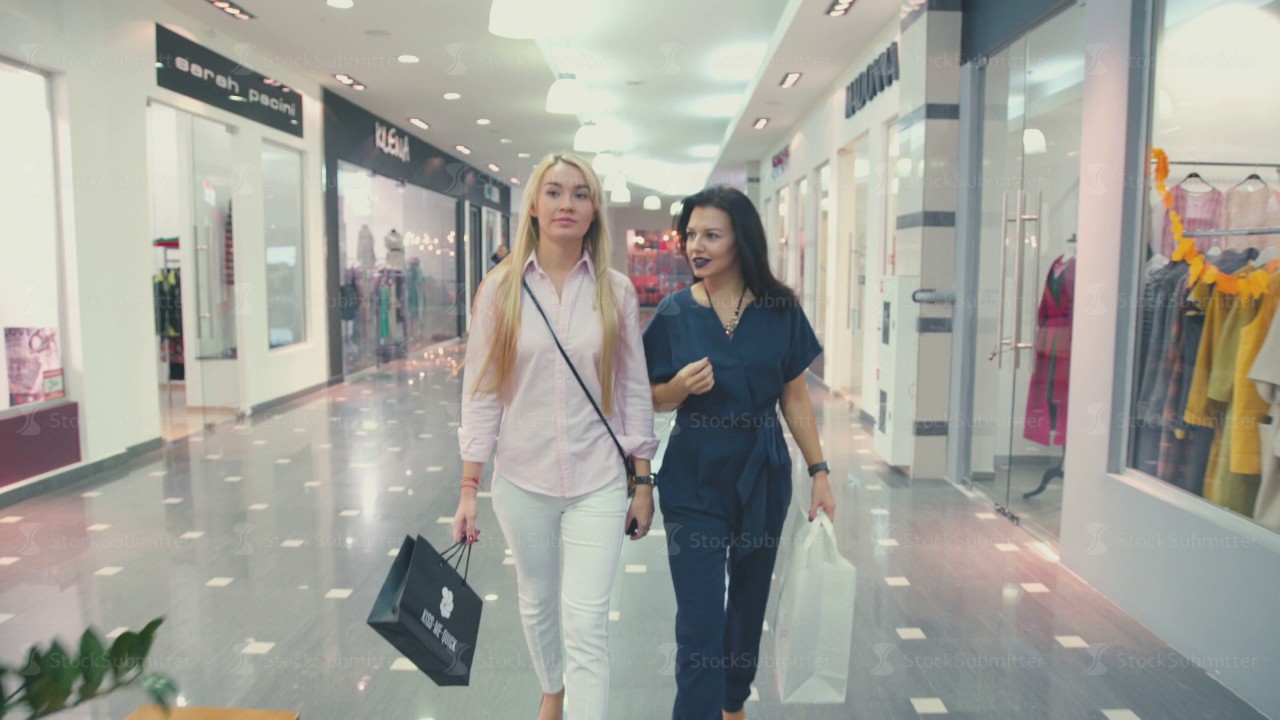 Two friends spend their time at the mall. Shopping girls - YouTube
