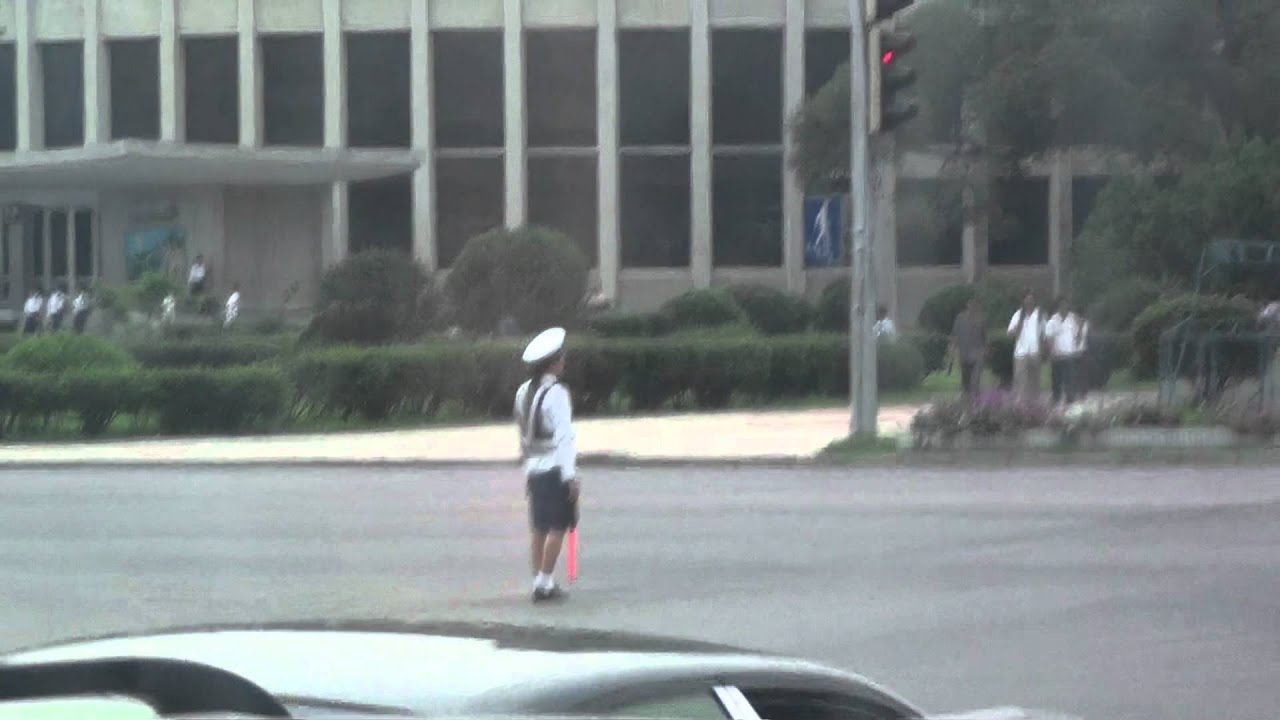 Traffic lady in Pyongyang (DPRK) - YouTube