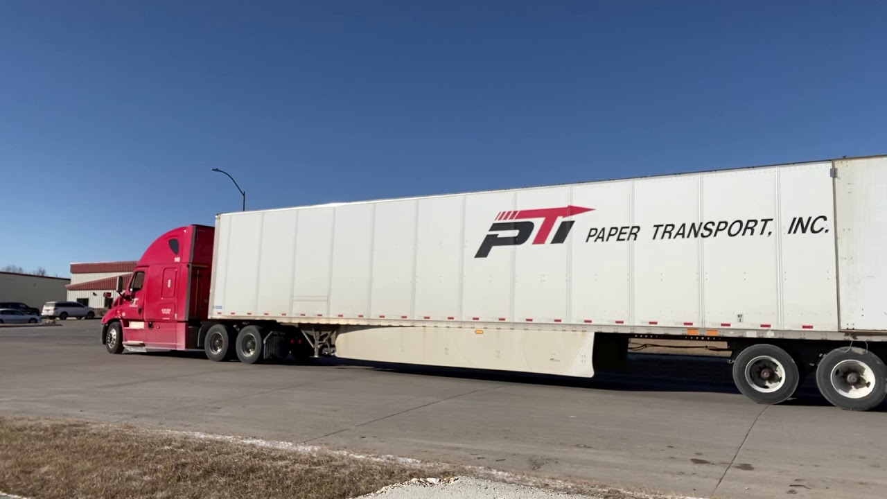 Semi Truck backing trailer into a dock - YouTube