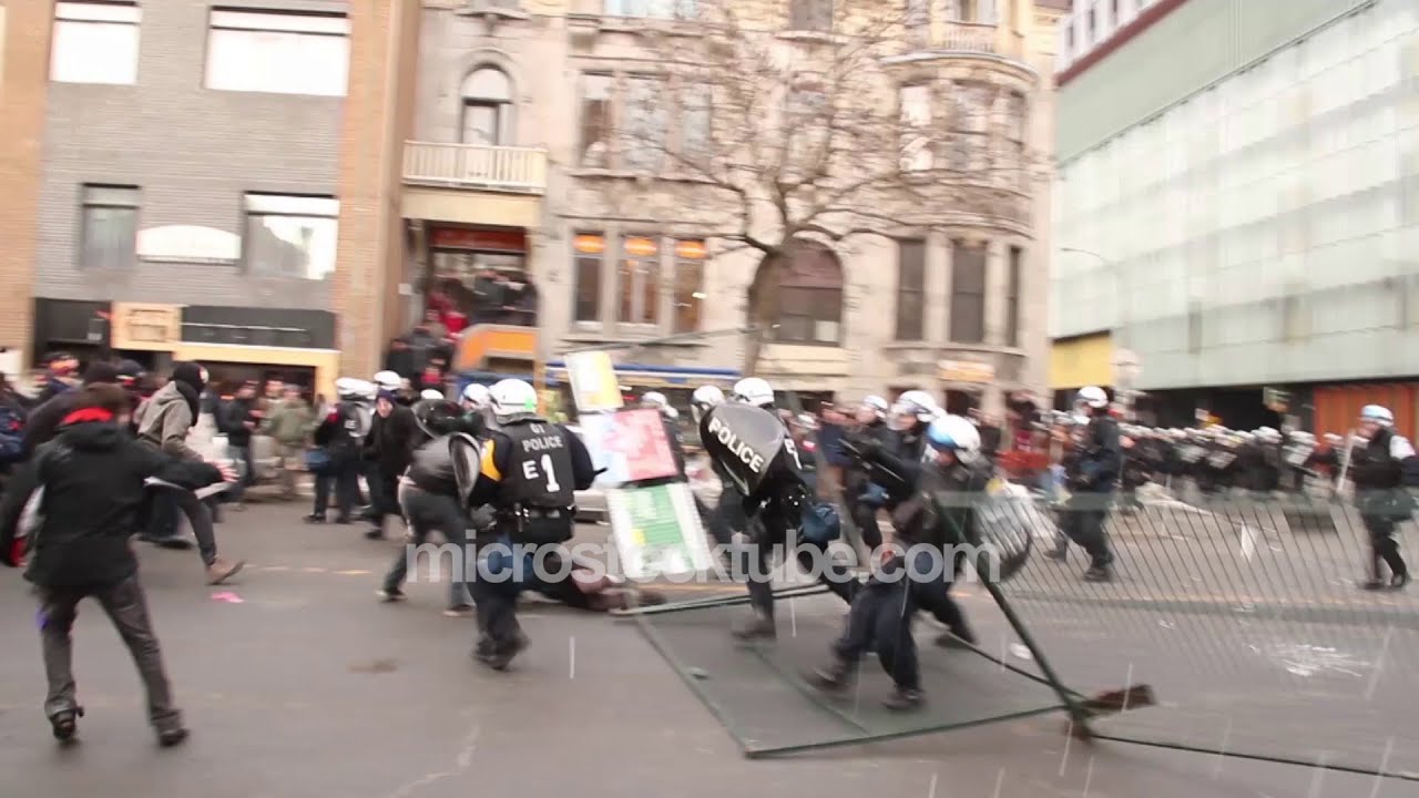 Riot police run and smash fence onto protesters - HD 1080p Montreal ...