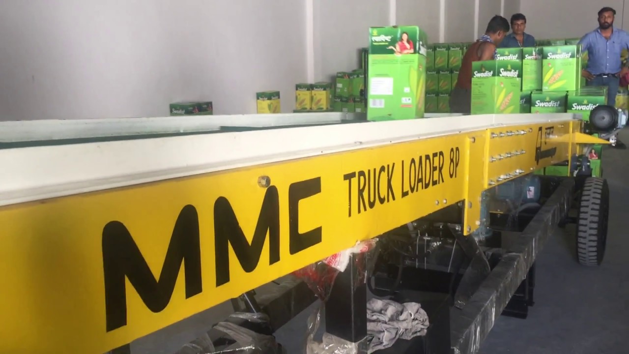 MMC Truck Loading Conveyor - Oil jar & Carton box Loading - YouTube