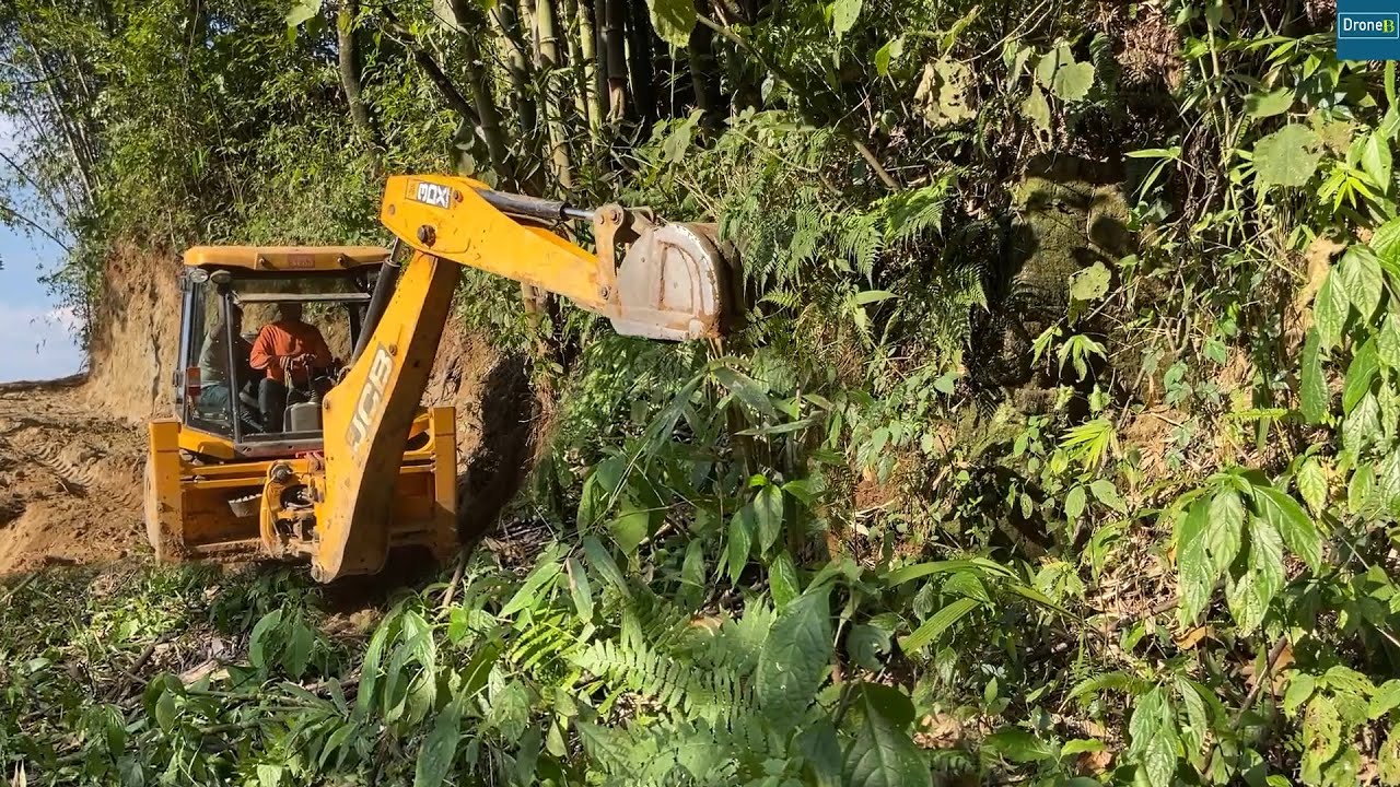 Narrow Road Construction with JCB Backhoe for Logging Deck - YouTube
