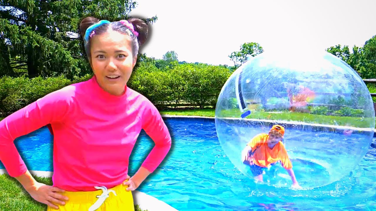 Ellie and Jimmy Play With Zorb Balls In The Swimming Pool! - YouTube