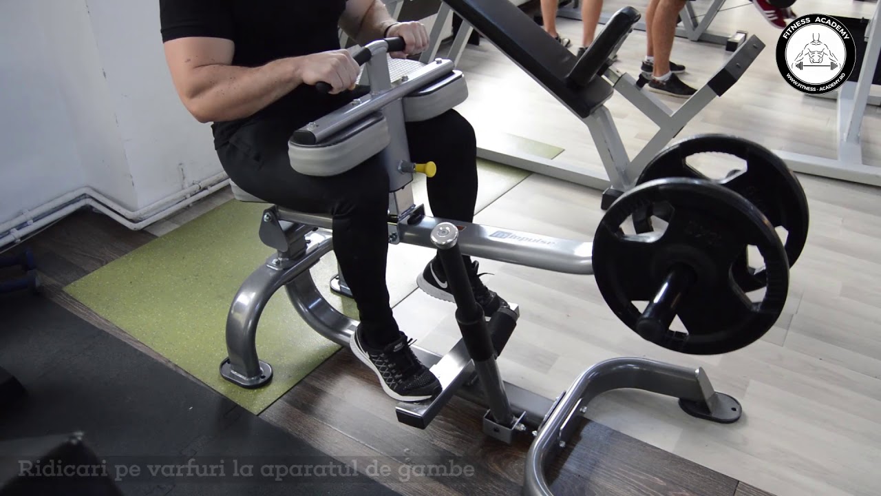 Ridicari pe varfuri la aparatul de gambe - www.fitness-academy.ro - YouTube